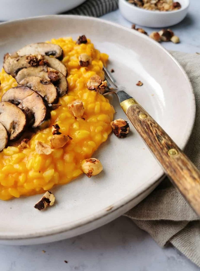 Vegan pompoen risotto met paddenstoelen
