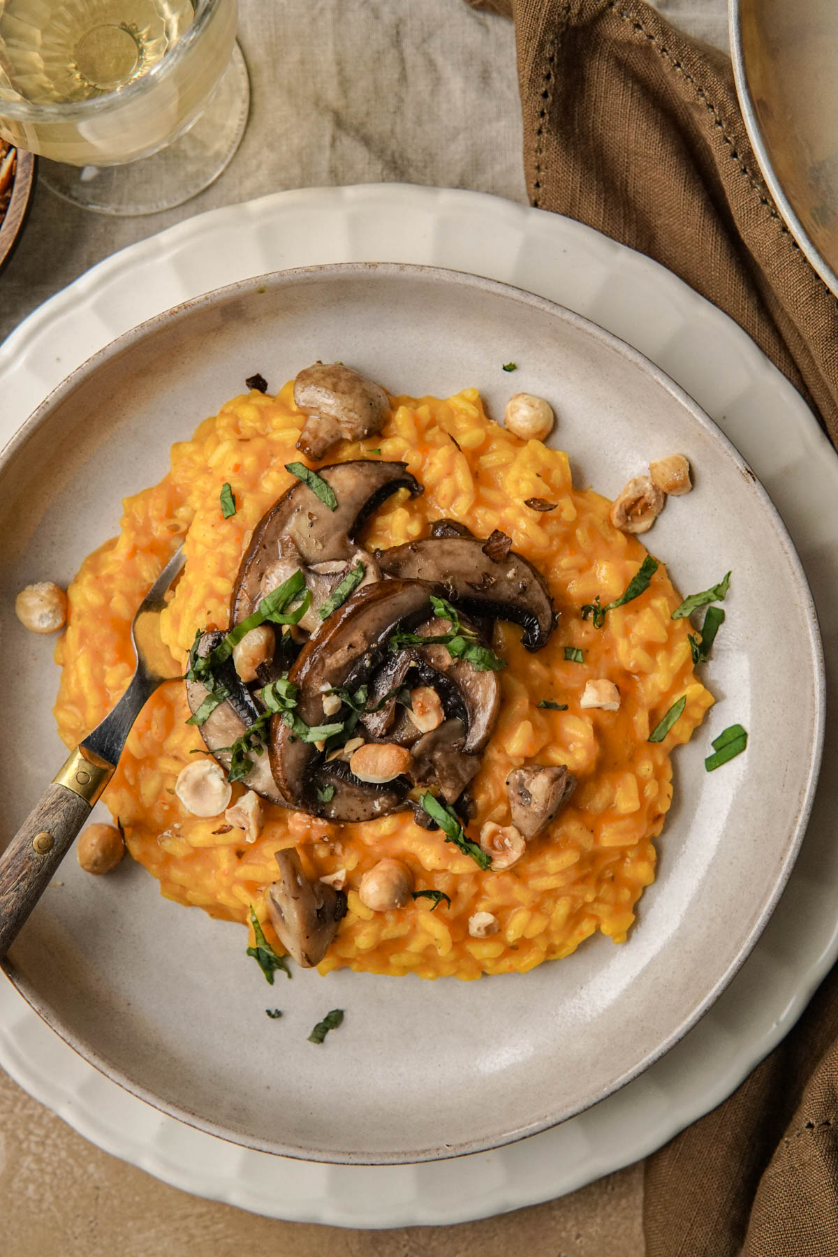 Vegan pompoen risotto met paddenstoelen